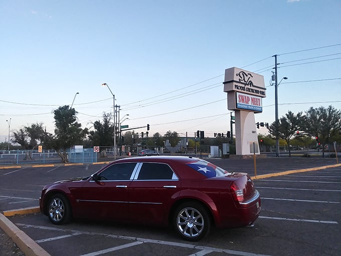 Evening light transforms an ordinary parking lot into something almost cinematic, where deals happen at dusk.