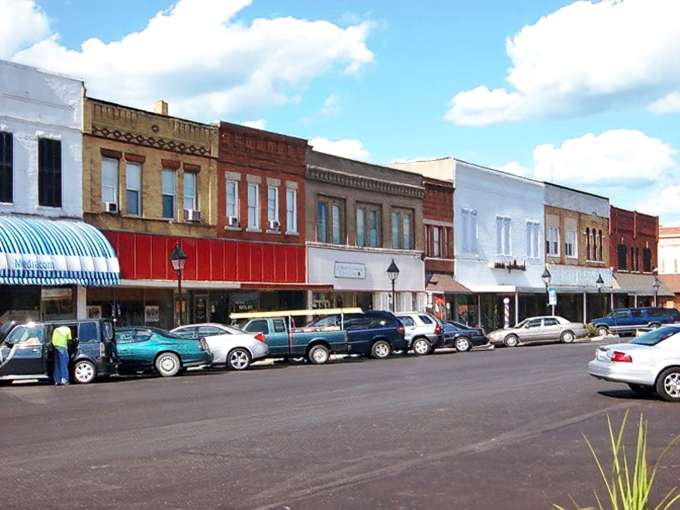 This downtown corridor invites leisurely strolls where every storefront tells its own unique community story.