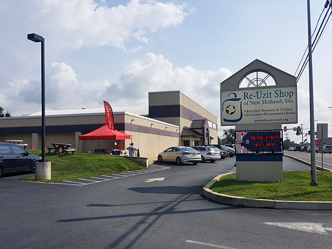 Sunshine and savings! Re-Uzit Shop's bright signage welcomes bargain hunters to one of Pennsylvania's best-kept thrifting secrets.