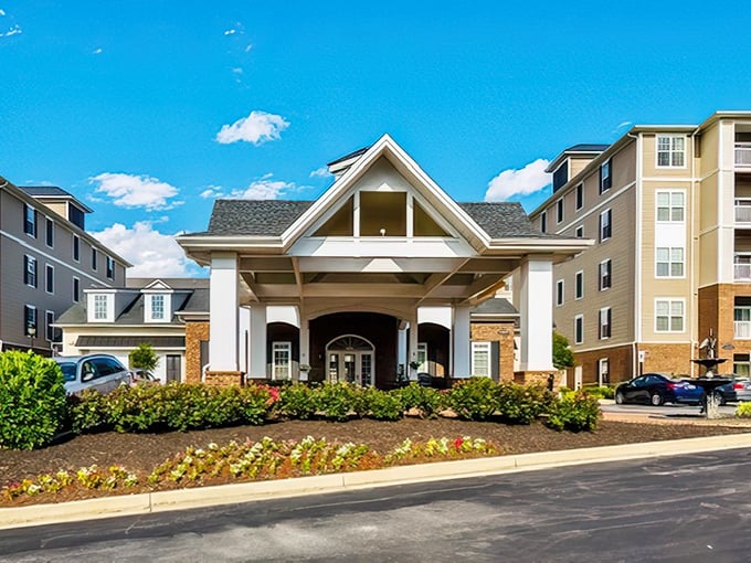 Classic columns and warm brick give this entrance the welcoming feel of a favorite family home.