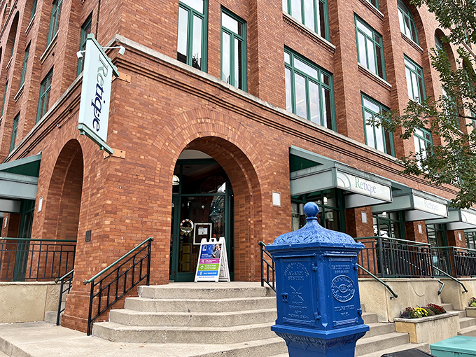 Arched windows and green awnings suggest treasures with more character than your average strip mall.
