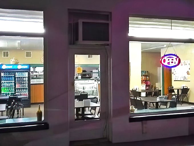 Peek through these windows and glimpse pizza paradise &ndash; where fluorescent lights illuminate deliciousness waiting to happen.