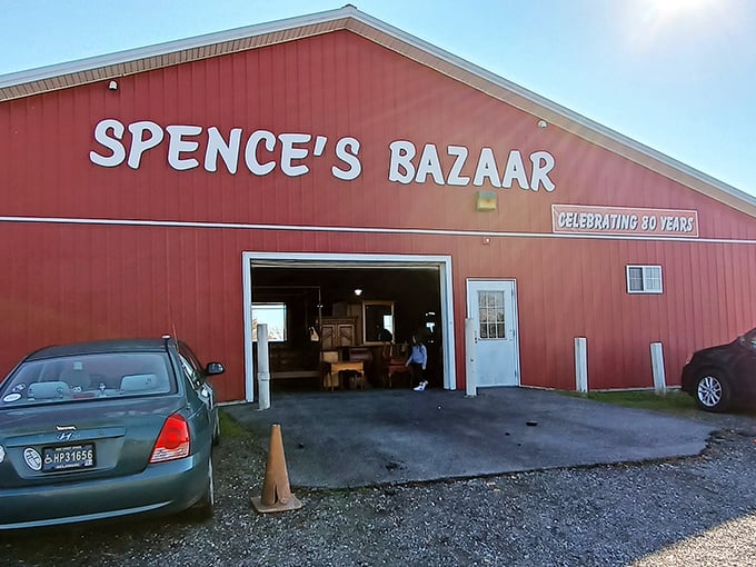 Spence's red barn stands proud like a beacon for bargain hunters seeking authentic small-town market magic.