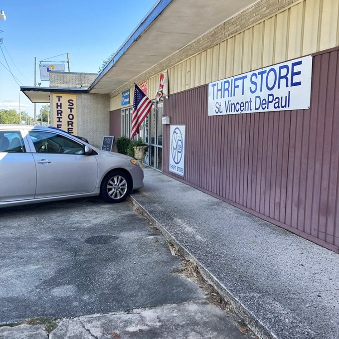 That American flag and welcoming entrance signal a community-focused shop with heart and soul.