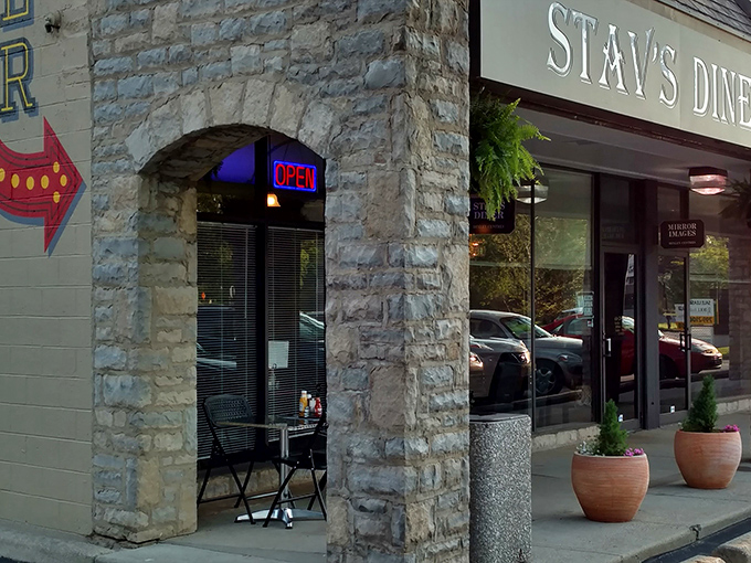 Those terra cotta planters and clean lines prove that contemporary design can still feel wonderfully welcoming.