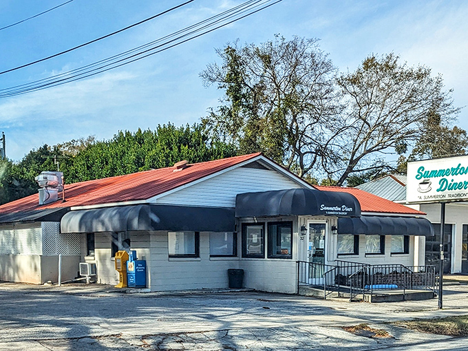 Blue awnings and hometown pride create the kind of atmosphere where strangers become fast friends.
