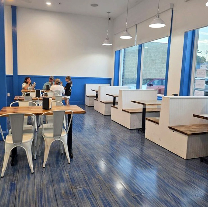 Those white booths by the windows are perfect for watching the world go by between sips.