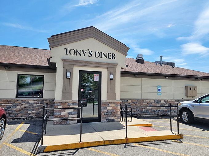 That stone facade might look modern, but inside beats the heart of an old-fashioned American diner.