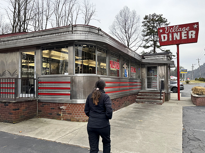 Stainless steel perfection with a side of nostalgia. Even on a gray day, this diner shines like a beacon for hungry travelers.