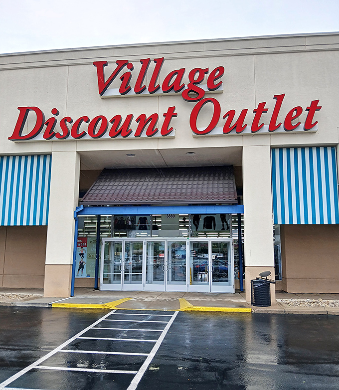 Those blue-striped awnings are like runway lights guiding thrift enthusiasts to their happy place.