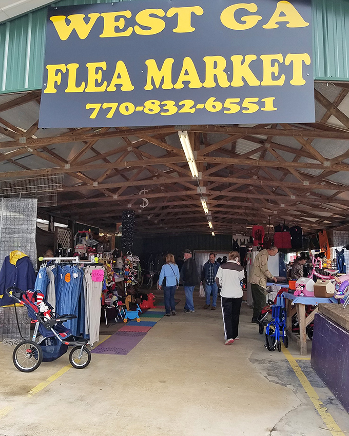 Shoppers browse West Georgia's covered walkways, where every stroller becomes a treasure chest waiting to be filled with unexpected finds.