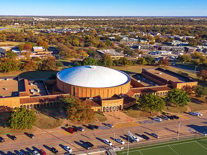 Round buildings and green spaces create a community hub where locals gather and friendships flourish.