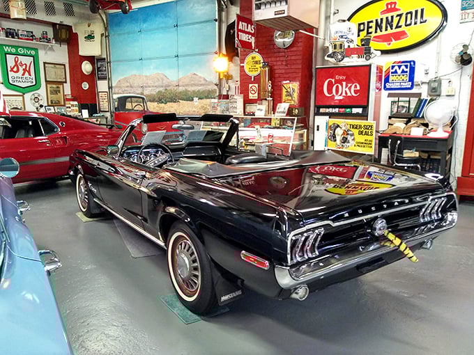 This sleek black Mustang convertible sits ready for its close-up, surrounded by enough Americana to fill a Norman Rockwell painting.