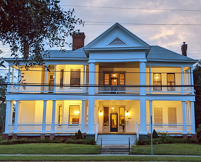 The Altama Museum's elegant white columns and wraparound porch offer a quintessentially Southern welcome to art and history enthusiasts.