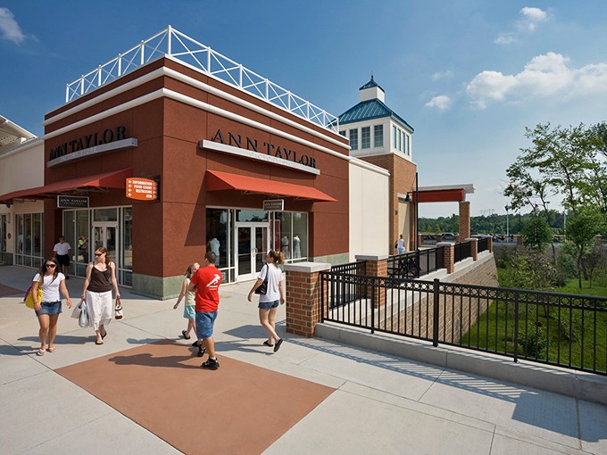 Ann Taylor's corner location catches the Pennsylvania sunshine perfectly, while shoppers with bags in hand celebrate their fashion victories on the wide, welcoming walkways. 