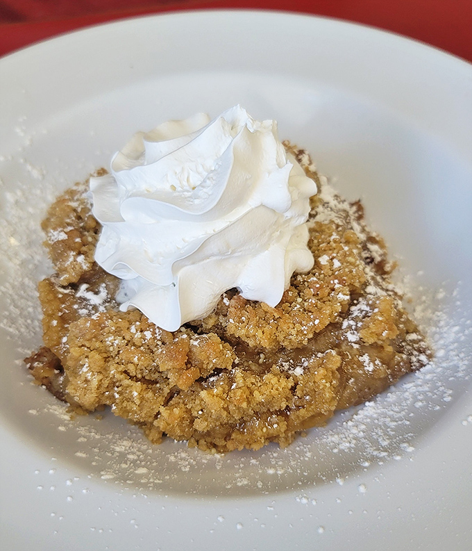 Apple crisp that tastes like autumn mornings and childhood memories wrapped in golden, buttery perfection.