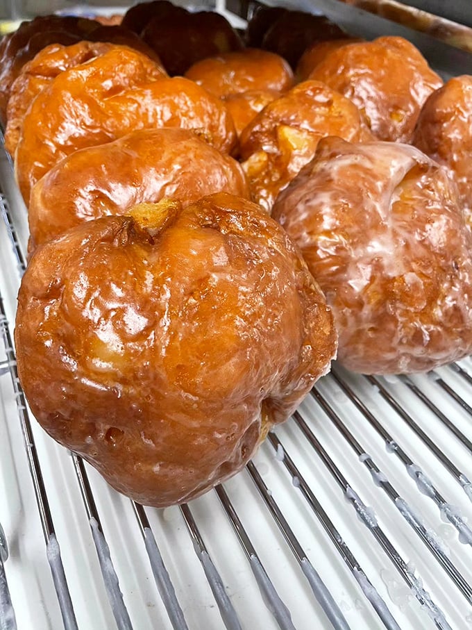 Apple fritters the size of your palm, with caramelized edges and pockets of cinnamon-spiced fruit &ndash; proof that "one size fits all" sometimes actually works.
