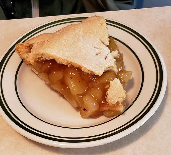 Apple pie that would make your grandmother both jealous and proud. Those glistening fruit chunks aren't just dessert&mdash;they're edible nostalgia.