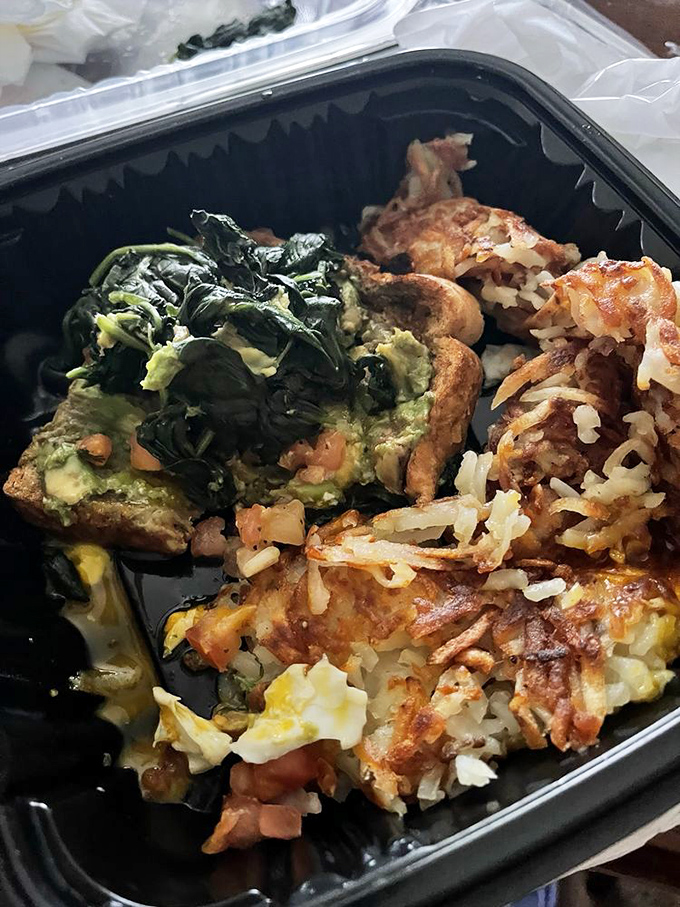 A hearty omelet packed with spinach and cheese &ndash; proof that sometimes the most satisfying meals come in to-go containers.