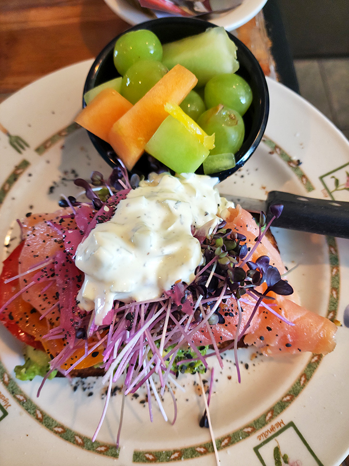 Salmon, microgreens, and creamy sauce atop fresh bread&mdash;this isn't just breakfast, it's edible artwork that happens to be nutritionally defensible.
