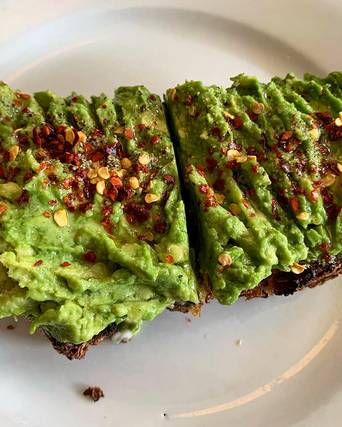Avocado toast that actually deserves its Instagram fame. Those red pepper flakes aren't just garnish&mdash;they're little flavor fireworks.