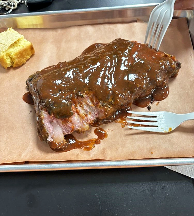 Glazed to perfection, these ribs practically surrender before your fork even makes contact with the meat.