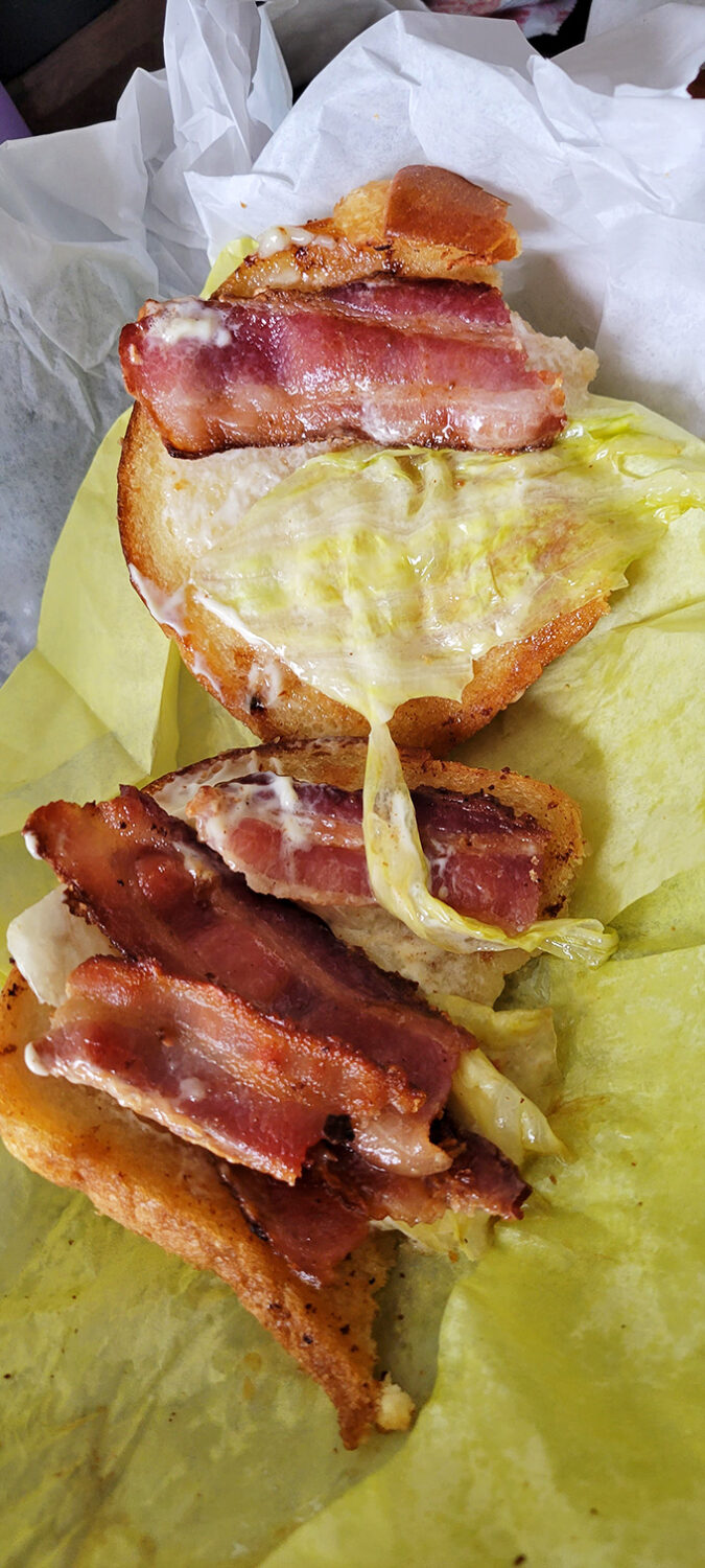 The BLT elevated to art form&mdash;where bacon doesn't just participate, it takes center stage in this handheld masterpiece.