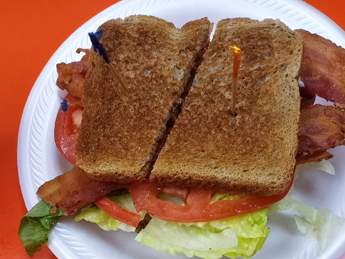 The legendary BLT that launched a thousand return visits. Notice how the bacon extends beyond the bread&mdash;that's not an accident, that's generosity.