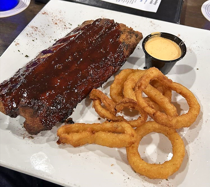 These baby back ribs don't just fall off the bone &ndash; they practically leap into your mouth, leaving behind a trail of sticky, sweet evidence on your fingers.