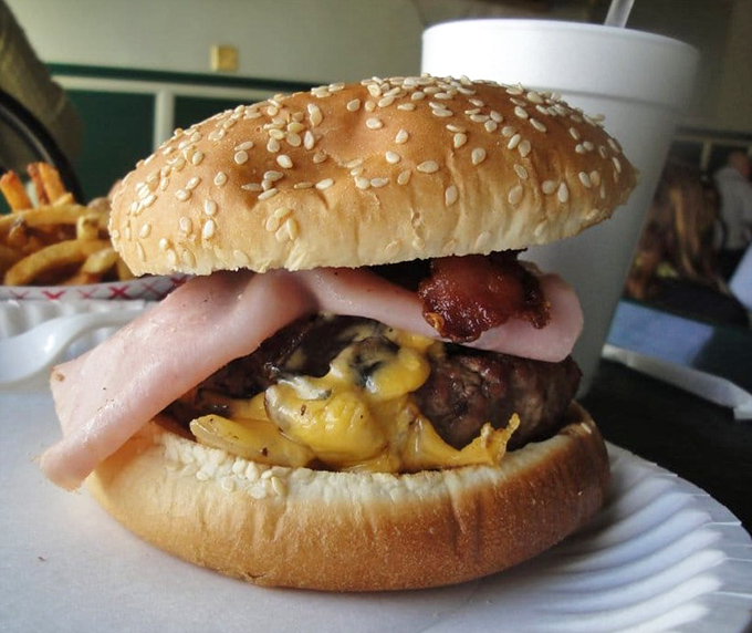 This isn't just a bacon cheeseburger&mdash;it's a masterclass in American comfort food, where ham, melted cheese, and beef create a holy trinity of flavor.