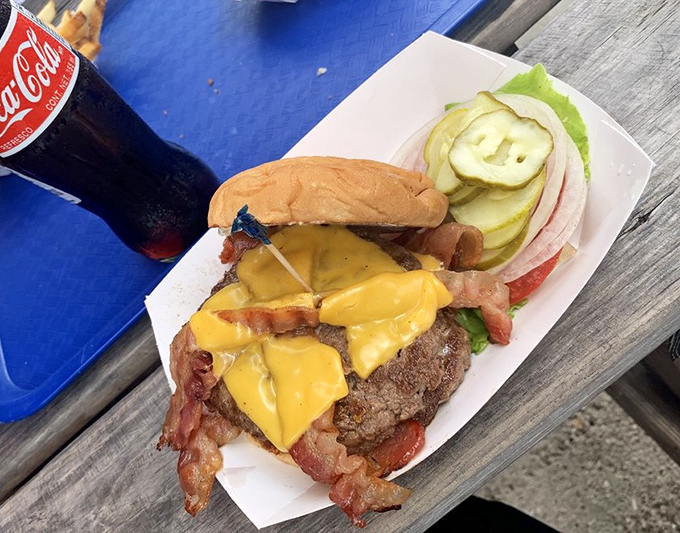 Bacon and cheese melting into beefy perfection&mdash;a sandwich that understands the meaning of "indulgence" without needing a dictionary.