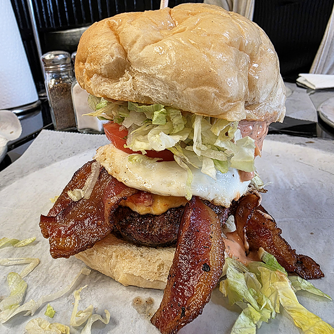 When bacon enters the chat, things get serious. Those crispy strips aren't just toppings &ndash; they're the crown jewels of this burger kingdom.
