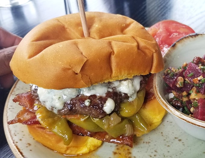 The burger that launched a thousand road trips. Those pickles aren't just garnish&mdash;they're essential supporting actors in this meaty drama.