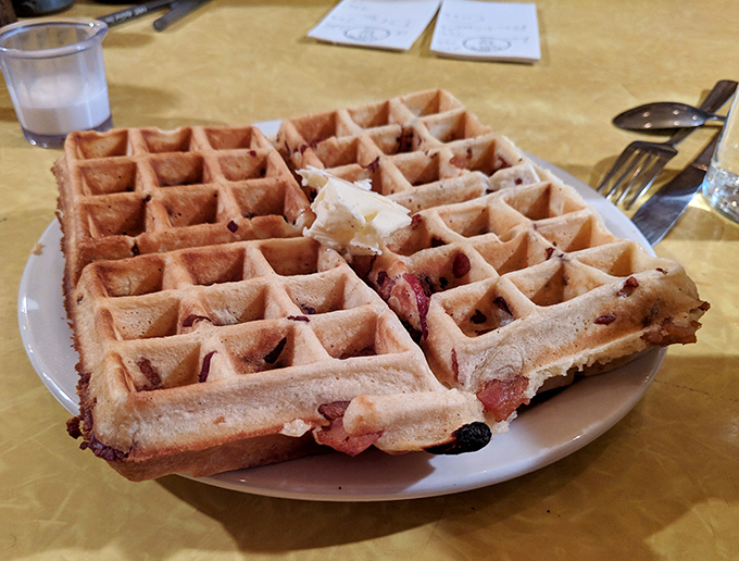 This blueberry waffle isn't just breakfast&mdash;it's edible architecture with perfect golden chambers waiting to be filled with melting butter and syrup.