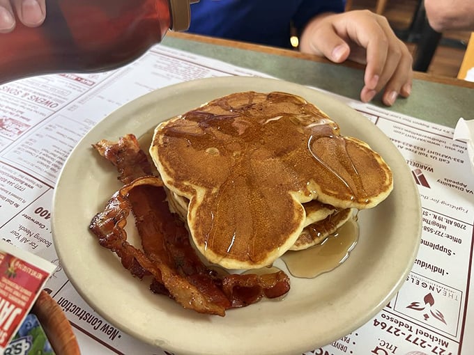 Golden pancakes and crispy bacon: the breakfast equivalent of a warm hug from your favorite aunt who always sneaks you extra dessert.
