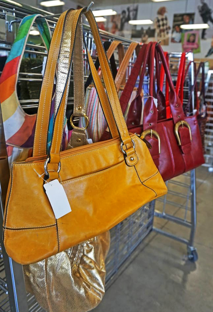 Handbag row: where yesterday's splurges become today's steals. That mustard-yellow purse is practically begging for a second chance at life.