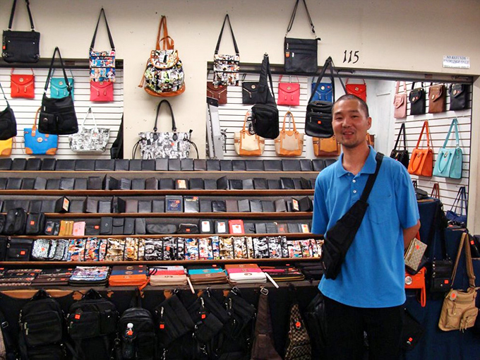 Bag heaven! This vendor's impressive display would make even the most minimalist shopper consider adding "just one more" to their collection.