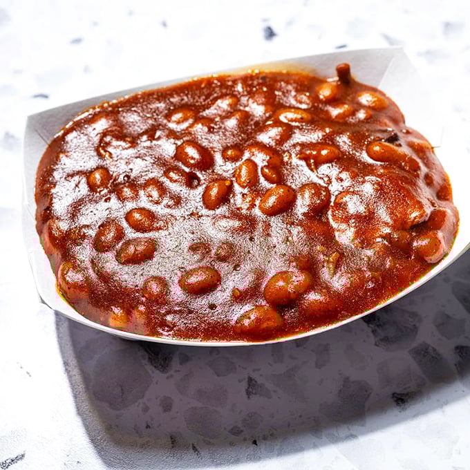 These baked beans aren't just a side dish—they're a supporting actor that deserves its own Oscar in the barbecue drama.