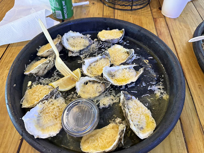 Baked oysters with melted cheese&mdash;where decadence meets the sea. Like little hot tubs of flavor that make you forget your table manners.