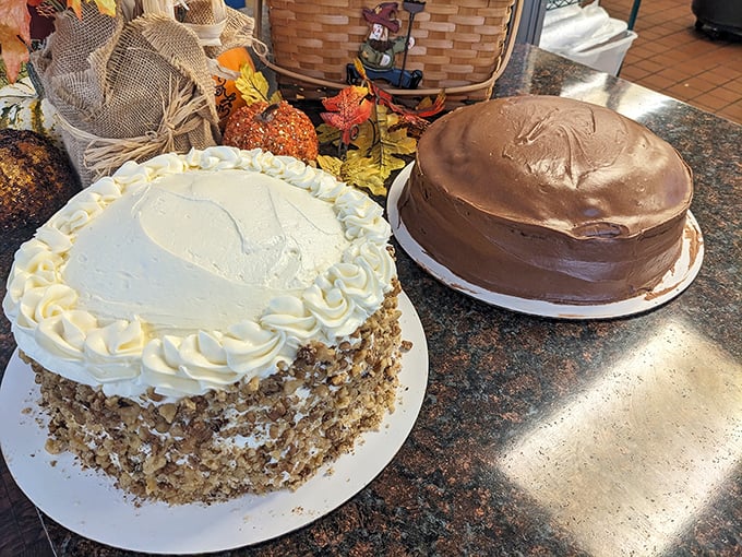 Cake royalty holding court! The banana nut with its crown of cream and the chocolate masterpiece standing guard &ndash; dessert democracy at its finest.