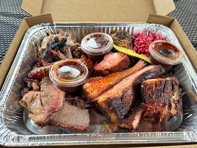 Barbecue platter nirvana! Those sauce cups aren't accessories&mdash;they're supporting actors in a meat-centered drama that always gets standing ovations.