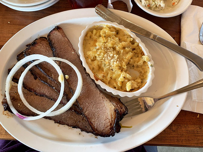 Brisket so tender it practically surrenders at the sight of a fork, paired with mac and cheese that would make your grandmother both jealous and proud. 