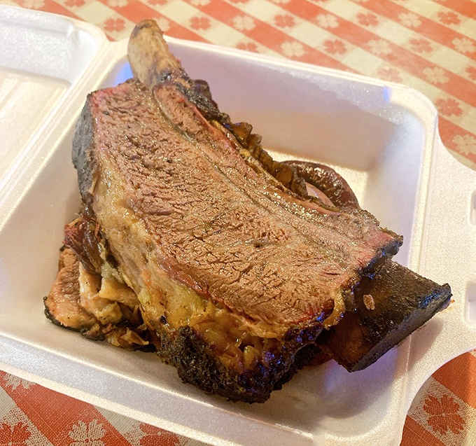 These beef ribs aren't just dinner, they're prehistoric monuments to smoke and patience&mdash;Fred Flintstone would weep with joy.