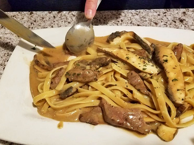Beef stroganoff that doesn't just sit on the plate but tells a story – ribbons of pasta embracing tender beef in a sauce worth swiping your finger for.