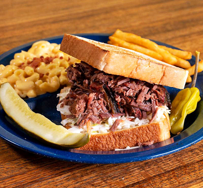 Architecture matters in sandwiches too. This brisket masterpiece demonstrates the perfect meat-to-bread ratio that'll make your taste buds stand at attention.