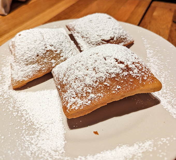 Beignets dusted with powdered sugar&mdash;because sometimes the simplest pleasures are the ones worth driving 25 miles for.