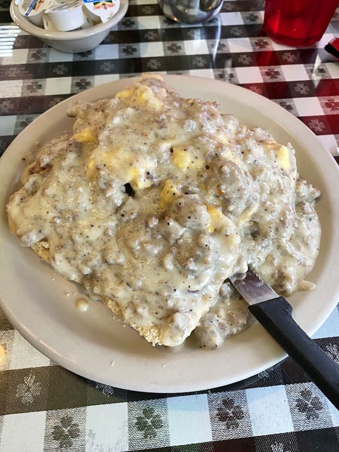 Biscuits and gravy that could make a Southern grandmother weep with joy. This creamy, peppery blanket of comfort doesn't just feed your body—it soothes your soul.