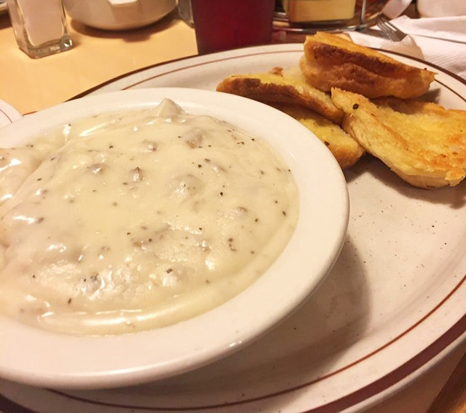 Biscuits and gravy that would make your grandmother both jealous and proud. Cloud-like biscuits swimming in creamy, peppery gravy&mdash;comfort in a bowl.