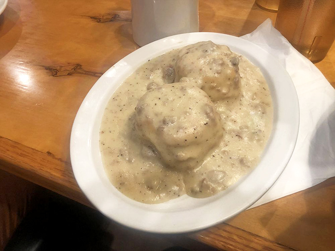 Biscuits swimming in creamy sausage gravy &ndash; the breakfast equivalent of a warm blanket on a cold morning. Comfort food that means business.