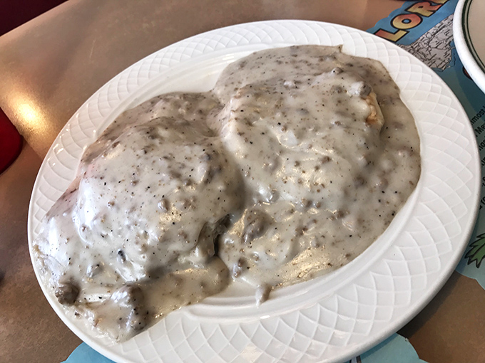 Biscuits swimming in creamy pepper gravy&mdash;the kind of dish that makes you want to hug the cook and thank your cardiologist in the same breath.